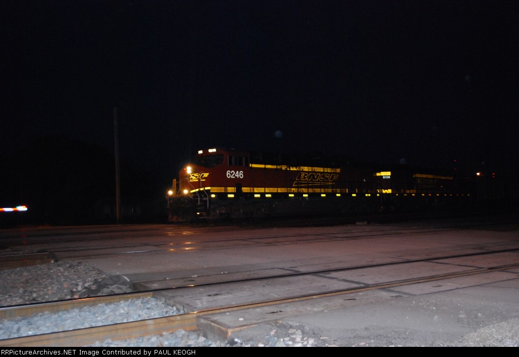 BNSF 6246 rolls west with a empty coal train in this night shot at Carlin Junction, NE.
